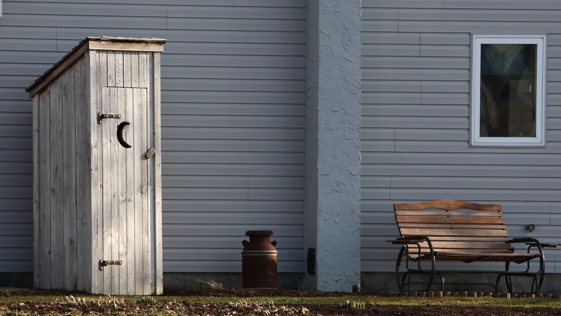 Cottage Q&A: The reason behind the outhouse door crescent moon ...